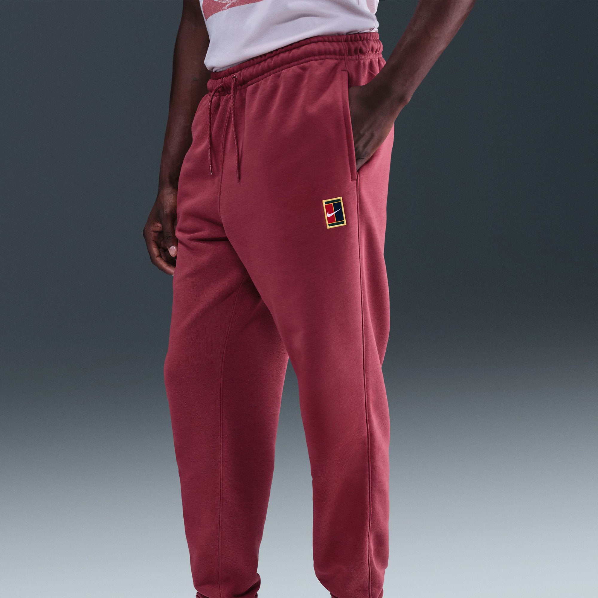 NikeCourt Heritage Men's Fleece Tennis Pants - Red | Tennis Only